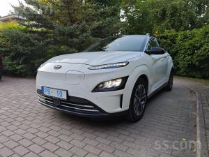 White Hyundai Kona 2022 in Riga, with an engine capacity of 1.60 L and mileage of 103 thousand km for 21100 €, photo  on AUTOMOTO.COM.LV