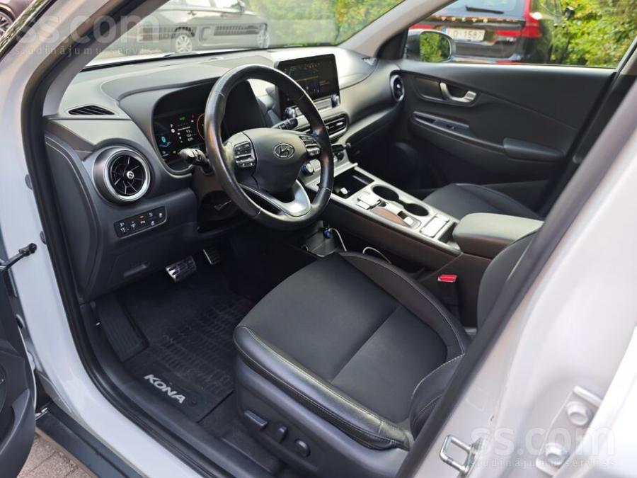 White Hyundai Kona 2022 in Riga, with an engine capacity of 1.60 L and mileage of 103 thousand km for 21100 €, photo 7 on AUTOMOTO.COM.LV
