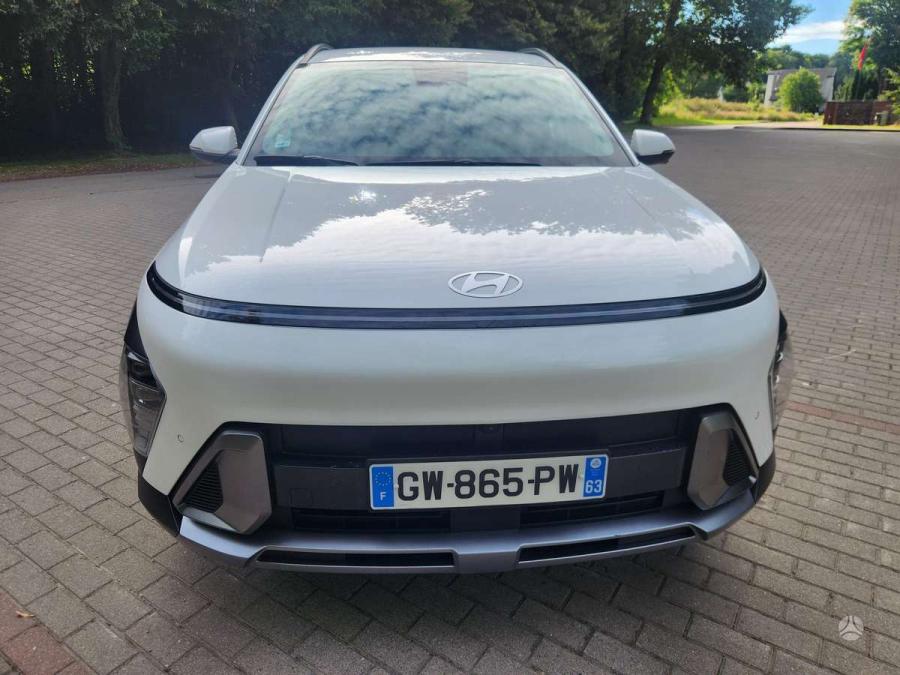 Balts Hyundai Kona 2024 Tauragė, ar dzinēja tilpumu 1.60 L un nobraukumu 148 tūkst. km par 18600 €, foto 4 vietnē AUTOMOTO.COM.LV