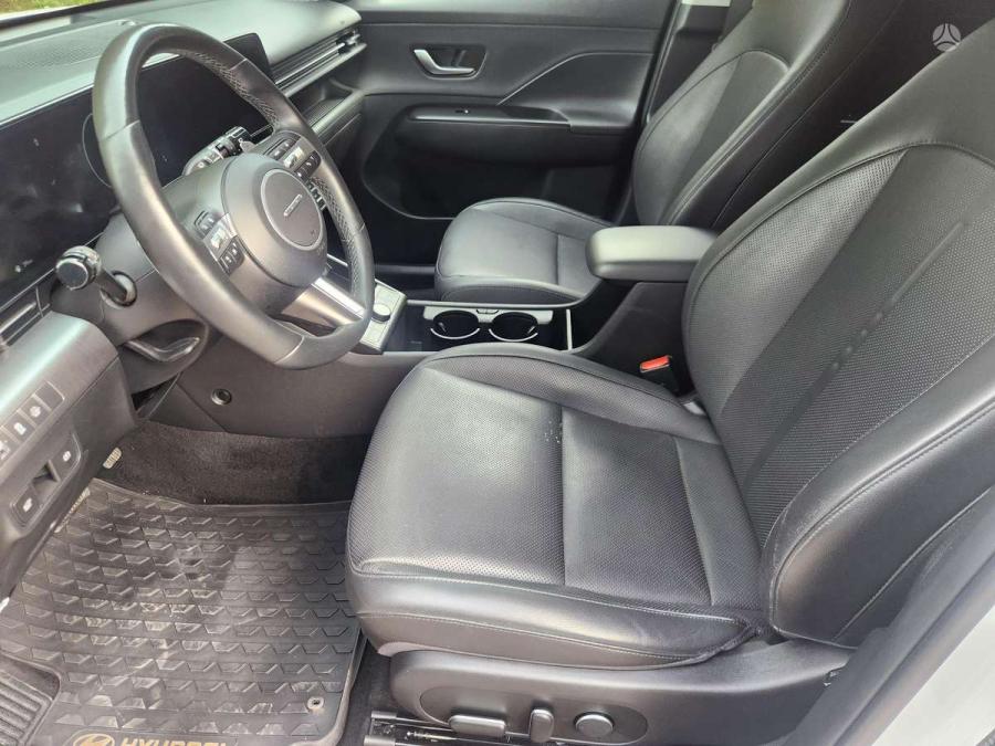 Balts Hyundai Kona 2024 Tauragė, ar dzinēja tilpumu 1.60 L un nobraukumu 148 tūkst. km par 18600 €, foto 14 vietnē AUTOMOTO.COM.LV