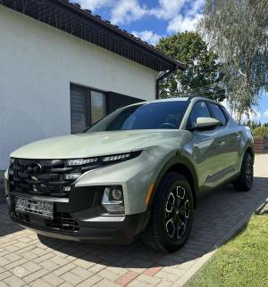 Green Hyundai Santa Cruz 2022 in Alytus, with an engine capacity of 2.50 L and mileage of 37 thousand km for 22900 €, photo 4 on AUTOMOTO.COM.LV