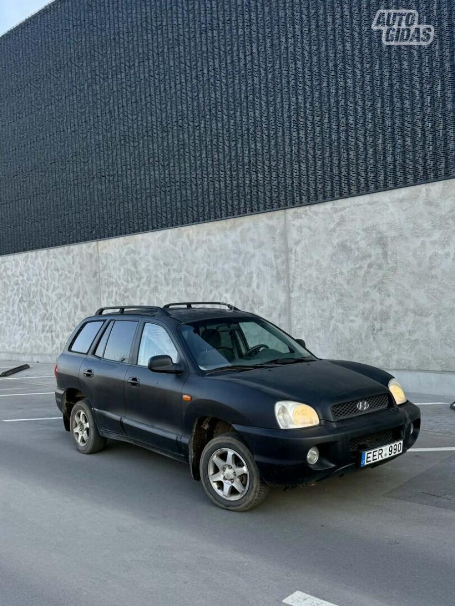 Melns Hyundai Santa Fe 2001 Viļņa, ar dzinēja tilpumu 2.00 L un nobraukumu 266 tūkst. km par 800 €, foto 1 vietnē AUTOMOTO.COM.LV