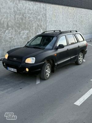 Melns Hyundai Santa Fe 2001 Viļņa, ar dzinēja tilpumu 2.00 L un nobraukumu 266 tūkst. km par 800 €, foto 3 vietnē AUTOMOTO.COM.LV