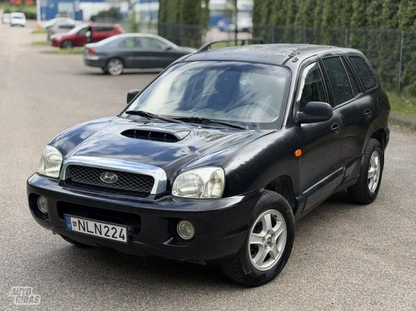 Melns Hyundai Santa Fe 2001 Viļņa, ar dzinēja tilpumu 2.00 L un nobraukumu 272 tūkst. km par 1450 €, foto 1 vietnē AUTOMOTO.COM.LV