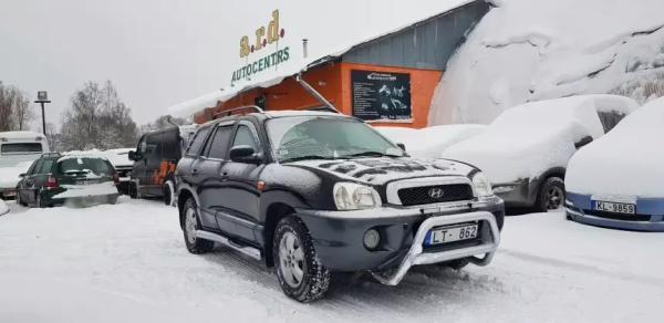 Melns Hyundai Santa Fe 2001 Valmiera, ar dzinēja tilpumu 2.40 L un nobraukumu 340 tūkst. km par 2500 €, foto 1 vietnē AUTOMOTO.COM.LV