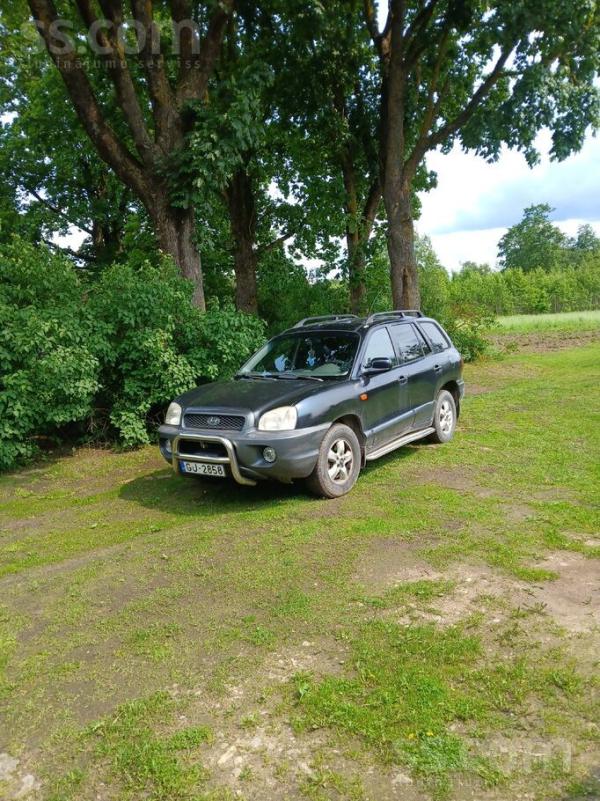 Black Hyundai Santa Fe 2002 in Bauska, with an engine capacity of 2.70 L and mileage of 349 thousand km for 1800 €, photo 3 on AUTOMOTO.COM.LV