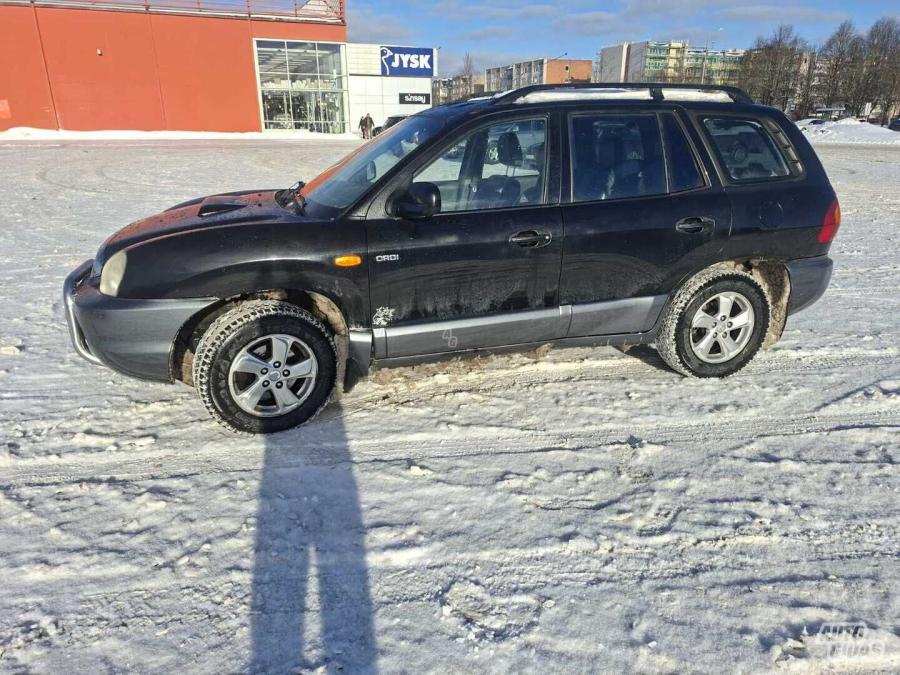 Black Hyundai Santa Fe 2002 in Telschi, with an engine capacity of 2.00 L and mileage of 280 thousand km for 1500 €, photo 2 on AUTOMOTO.COM.LV