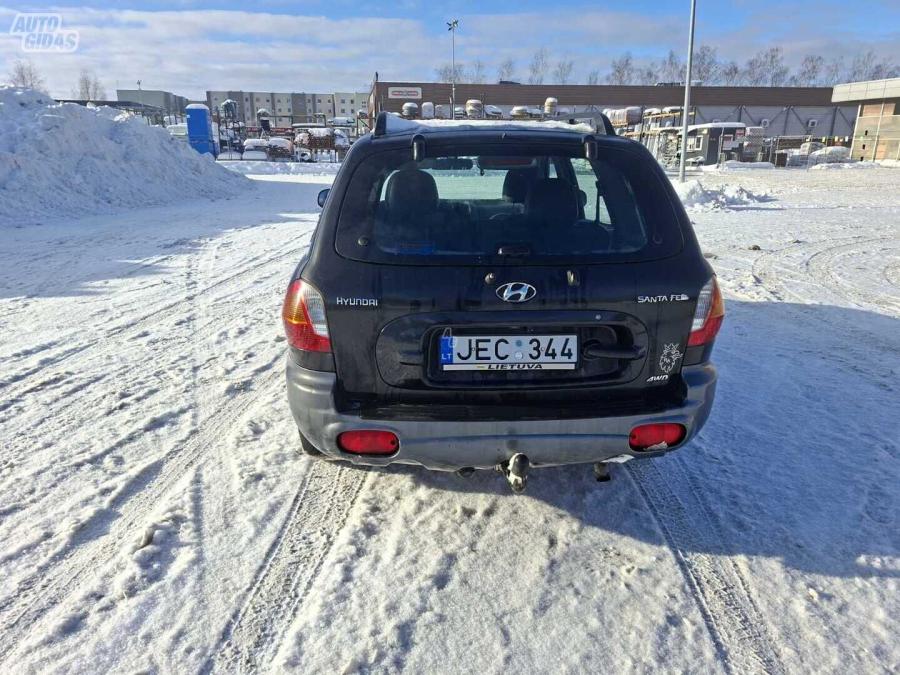 Black Hyundai Santa Fe 2002 in Telschi, with an engine capacity of 2.00 L and mileage of 280 thousand km for 1500 €, photo 4 on AUTOMOTO.COM.LV