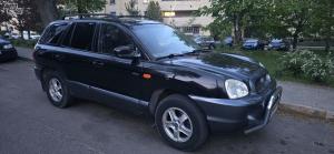 Melns Hyundai Santa Fe 2003 Viļņa, ar dzinēja tilpumu 2.00 L un nobraukumu 197 tūkst. km par 2800 €, foto  vietnē AUTOMOTO.COM.LV
