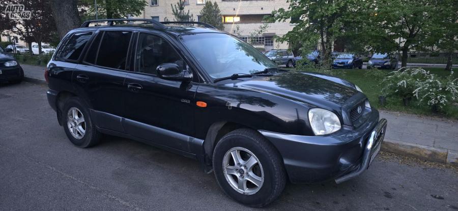 Black Hyundai Santa Fe 2003 in Vilnius, with an engine capacity of 2.00 L and mileage of 197 thousand km for 2800 €, photo 1 on AUTOMOTO.COM.LV