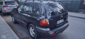 Black Hyundai Santa Fe 2003 in Vilnius, with an engine capacity of 2.00 L and mileage of 197 thousand km for 2800 €, photo 7 on AUTOMOTO.COM.LV