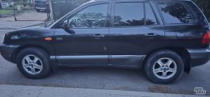 Black Hyundai Santa Fe 2003 in Vilnius, with an engine capacity of 2.00 L and mileage of 197 thousand km for 2800 €, photo 8 on AUTOMOTO.COM.LV
