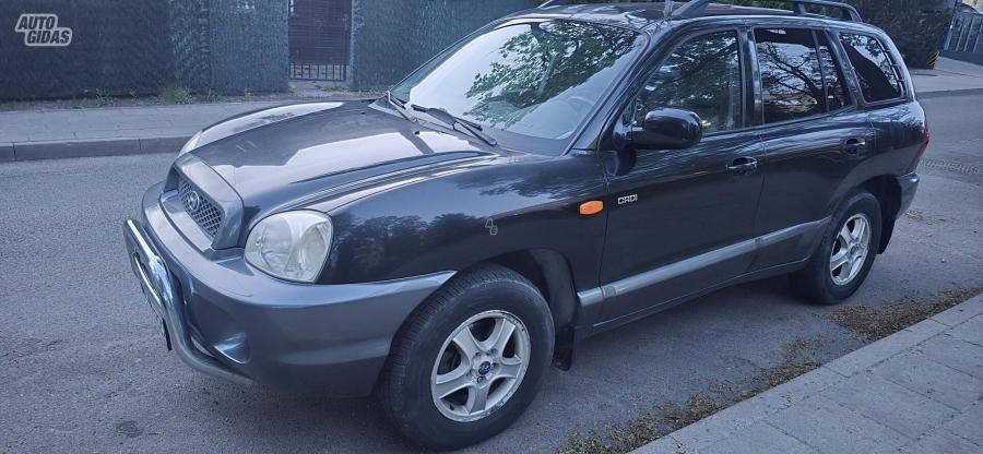 Black Hyundai Santa Fe 2003 in Vilnius, with an engine capacity of 2.00 L and mileage of 197 thousand km for 2800 €, photo 9 on AUTOMOTO.COM.LV