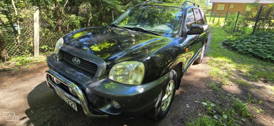 Melns Hyundai Santa Fe 2003 Viļņa, ar dzinēja tilpumu 2.00 L un nobraukumu 198 tūkst. km par 2000 €, foto 1 vietnē AUTOMOTO.COM.LV