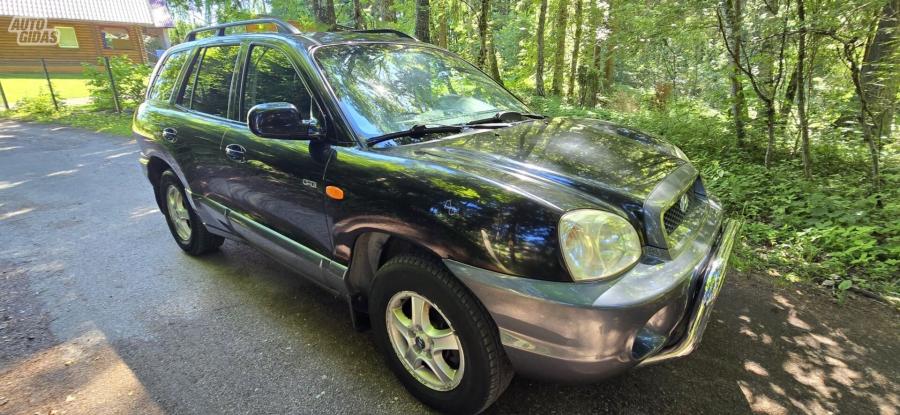 Melns Hyundai Santa Fe 2003 Viļņa, ar dzinēja tilpumu 2.00 L un nobraukumu 198 tūkst. km par 2000 €, foto 4 vietnē AUTOMOTO.COM.LV