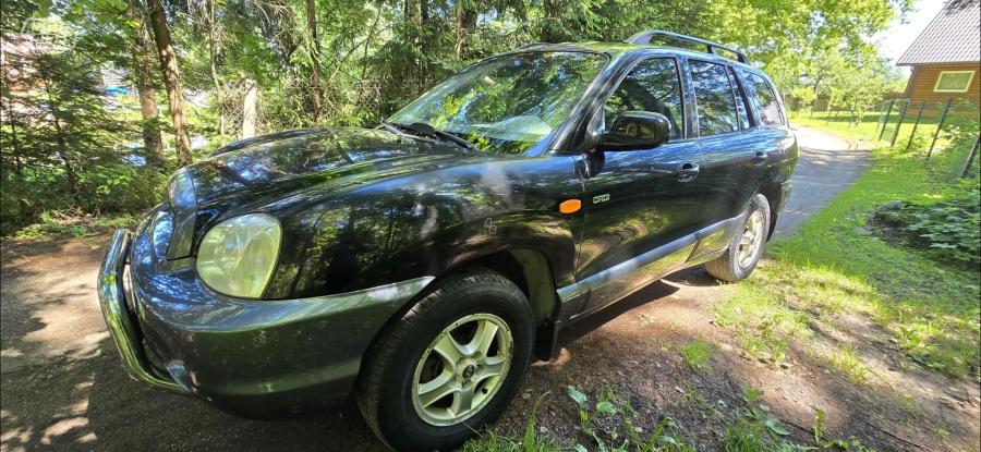 Melns Hyundai Santa Fe 2003 Viļņa, ar dzinēja tilpumu 2.00 L un nobraukumu 198 tūkst. km par 2000 €, foto 6 vietnē AUTOMOTO.COM.LV