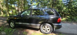 Melns Hyundai Santa Fe 2003 Viļņa, ar dzinēja tilpumu 2.00 L un nobraukumu 198 tūkst. km par 2000 €, foto 7 vietnē AUTOMOTO.COM.LV