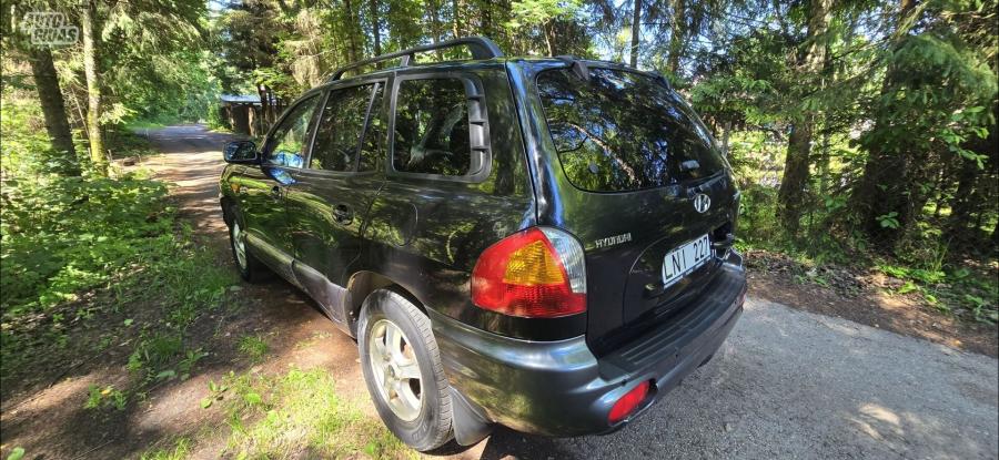 Melns Hyundai Santa Fe 2003 Viļņa, ar dzinēja tilpumu 2.00 L un nobraukumu 198 tūkst. km par 2000 €, foto 8 vietnē AUTOMOTO.COM.LV