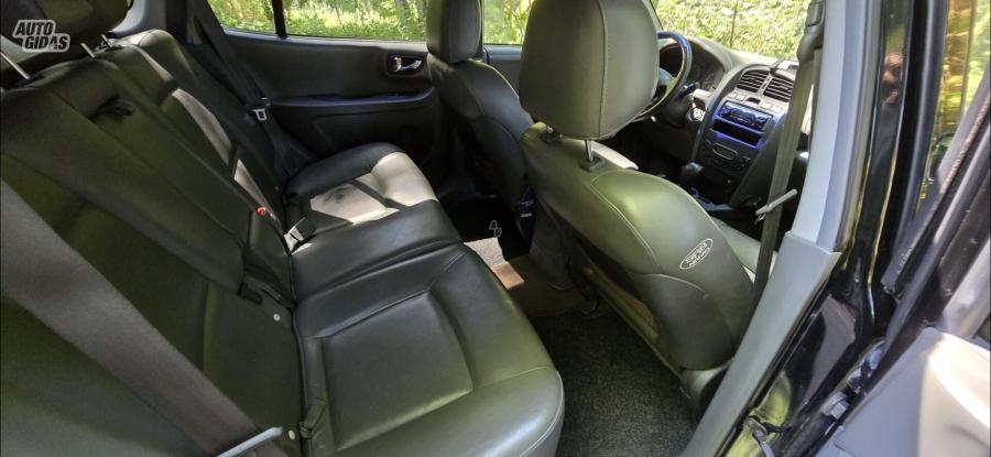 Melns Hyundai Santa Fe 2003 Viļņa, ar dzinēja tilpumu 2.00 L un nobraukumu 198 tūkst. km par 2000 €, foto 12 vietnē AUTOMOTO.COM.LV