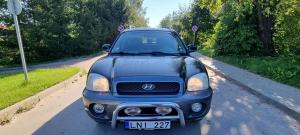 Black Hyundai Santa Fe 2003 in Vilnius, with an engine capacity of 1.99 L and mileage of 198 thousand km for 1800 €, photo  on AUTOMOTO.COM.LV