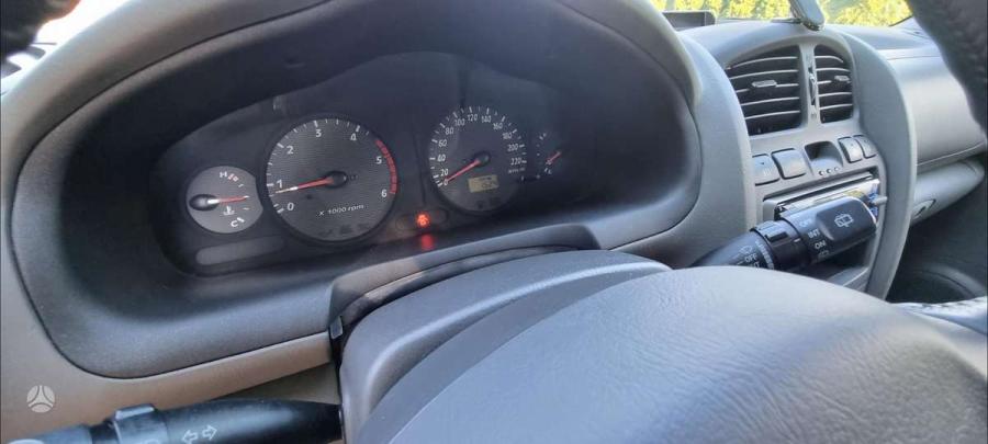 Black Hyundai Santa Fe 2003 in Vilnius, with an engine capacity of 1.99 L and mileage of 198 thousand km for 1800 €, photo 11 on AUTOMOTO.COM.LV
