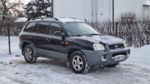 Melns Hyundai Santa Fe 2004 Viļņa, ar dzinēja tilpumu 2.00 L un nobraukumu 419 tūkst. km par 1650 €, foto  vietnē AUTOMOTO.COM.LV