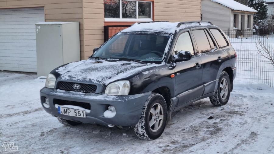 Black Hyundai Santa Fe 2004 in Vilnius, with an engine capacity of 2.00 L and mileage of 419 thousand km for 1650 €, photo 4 on AUTOMOTO.COM.LV