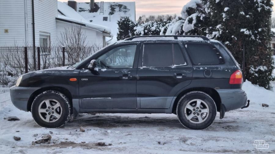 Black Hyundai Santa Fe 2004 in Vilnius, with an engine capacity of 2.00 L and mileage of 419 thousand km for 1650 €, photo 5 on AUTOMOTO.COM.LV