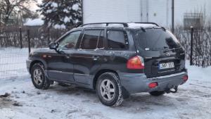 Black Hyundai Santa Fe 2004 in Vilnius, with an engine capacity of 2.00 L and mileage of 419 thousand km for 1650 €, photo 6 on AUTOMOTO.COM.LV