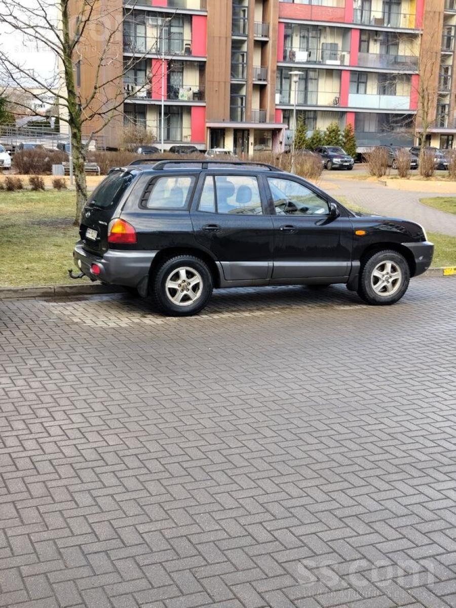 Melns Hyundai Santa Fe 2004 Rīga, ar dzinēja tilpumu 2.40 L un nobraukumu 0 tūkst. km par 1400 €, foto 1 vietnē AUTOMOTO.COM.LV