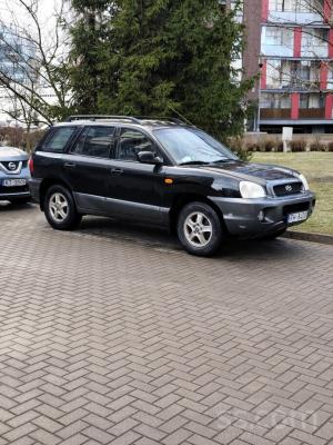 Melns Hyundai Santa Fe 2004 Rīga, ar dzinēja tilpumu 2.40 L un nobraukumu 0 tūkst. km par 1400 €, foto 3 vietnē AUTOMOTO.COM.LV