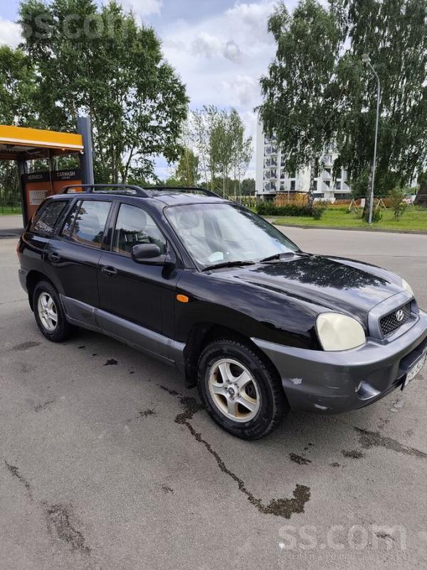 Melns Hyundai Santa Fe 2004 Rīga, ar dzinēja tilpumu 2.40 L un nobraukumu 0 tūkst. km par 950 €, foto 1 vietnē AUTOMOTO.COM.LV