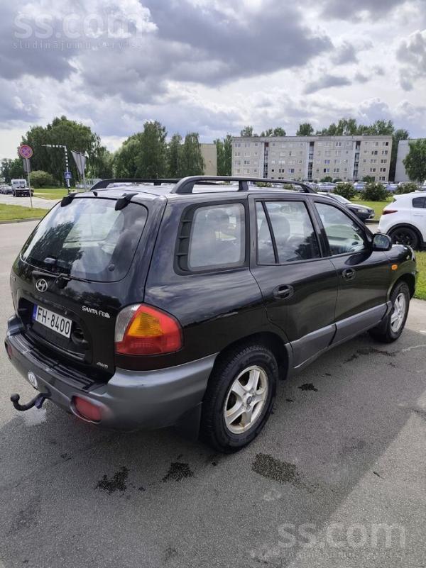 Melns Hyundai Santa Fe 2004 Rīga, ar dzinēja tilpumu 2.40 L un nobraukumu 0 tūkst. km par 950 €, foto 3 vietnē AUTOMOTO.COM.LV