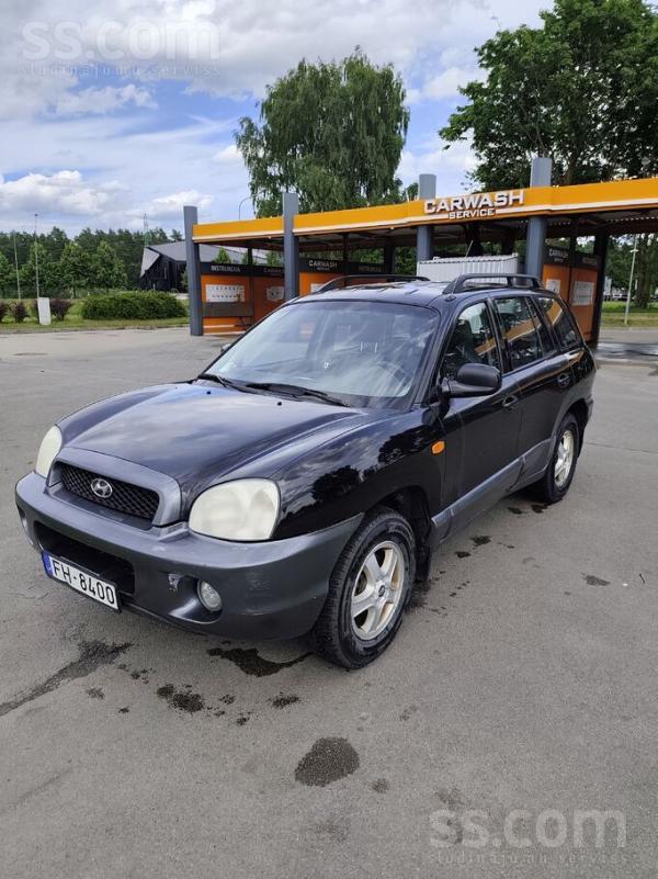 Melns Hyundai Santa Fe 2004 Rīga, ar dzinēja tilpumu 2.40 L un nobraukumu 0 tūkst. km par 950 €, foto 5 vietnē AUTOMOTO.COM.LV