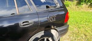 Black Hyundai Santa Fe 2004 in Siauliai, with an engine capacity of 2.40 L and mileage of 213 thousand km for 900 €, photo 14 on AUTOMOTO.COM.LV