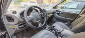 Black Hyundai Santa Fe 2004 in Siauliai, with an engine capacity of 2.40 L and mileage of 213 thousand km for 900 €, photo 18 on AUTOMOTO.COM.LV