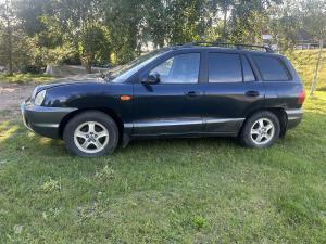 Black Hyundai Santa Fe 2004 in Zarasai, with an engine capacity of 2.35 L and mileage of 270 thousand km for 850 €, photo 3 on AUTOMOTO.COM.LV