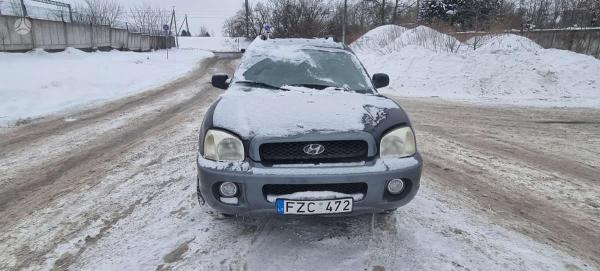 Black Hyundai Santa Fe 2005 in Vilnius, with an engine capacity of 1.99 L and mileage of 319 thousand km for 1000 €, photo 2 on AUTOMOTO.COM.LV
