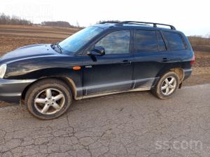 Black Hyundai Santa Fe 2005 in Preili, with an engine capacity of 2.00 L and mileage of 300 thousand km for 1800 €, photo 12 on AUTOMOTO.COM.LV