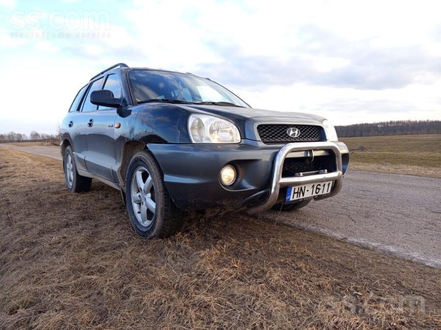 Black Hyundai Santa Fe 2005 in Preili, with an engine capacity of 2.00 L and mileage of 300 thousand km for 1800 €, photo 14 on AUTOMOTO.COM.LV