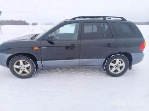 Melns Hyundai Santa Fe 2005 Preiļi, ar dzinēja tilpumu 2.00 L un nobraukumu 300 tūkst. km par 2100 €, foto  vietnē AUTOMOTO.COM.LV