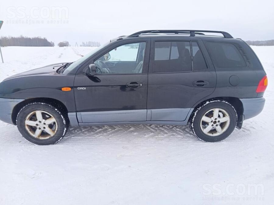 Melns Hyundai Santa Fe 2005 Preiļi, ar dzinēja tilpumu 2.00 L un nobraukumu 300 tūkst. km par 2100 €, foto 1 vietnē AUTOMOTO.COM.LV