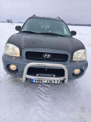Melns Hyundai Santa Fe 2005 Preiļi, ar dzinēja tilpumu 2.00 L un nobraukumu 300 tūkst. km par 2100 €, foto 4 vietnē AUTOMOTO.COM.LV