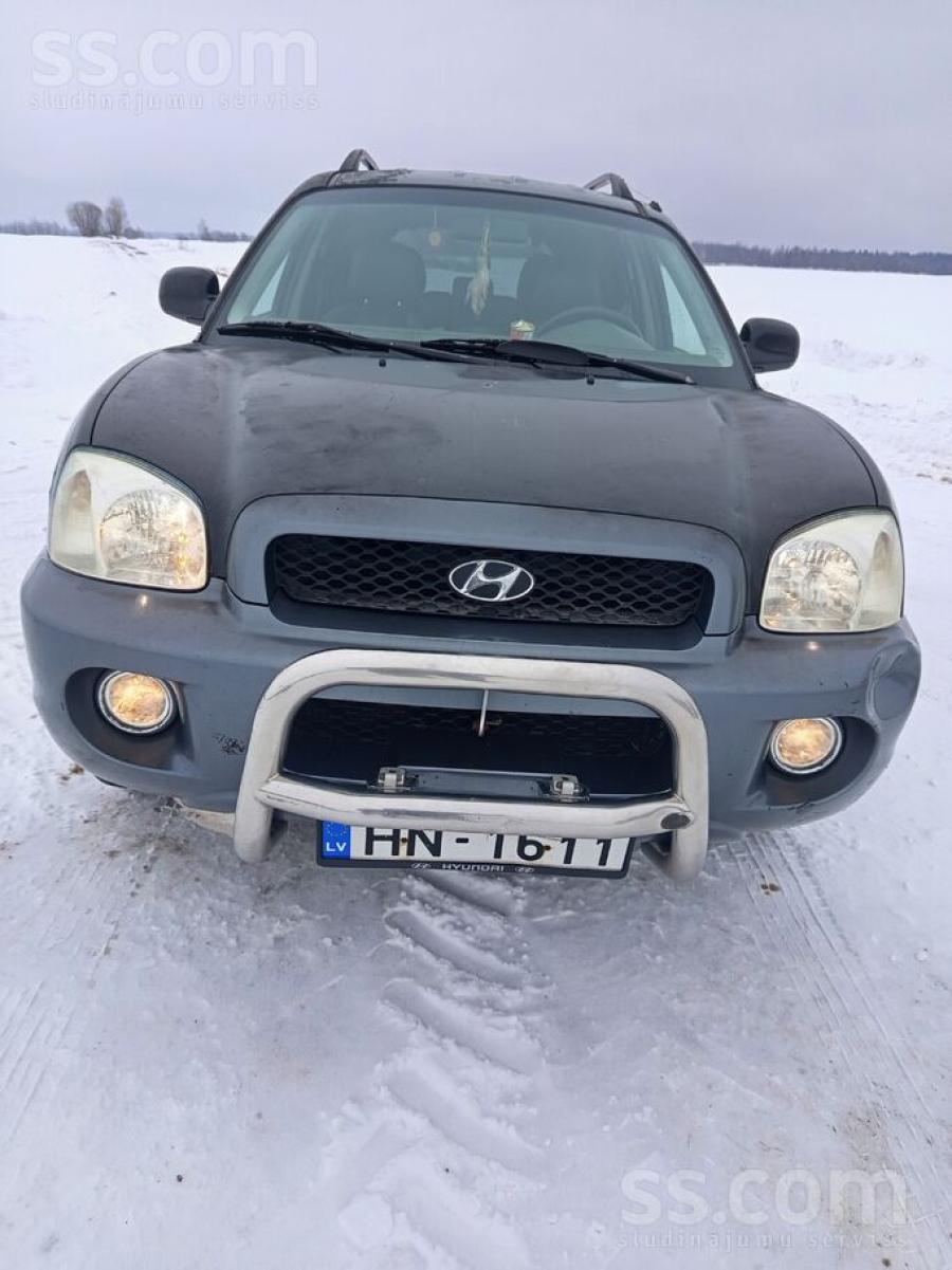 Melns Hyundai Santa Fe 2005 Preiļi, ar dzinēja tilpumu 2.00 L un nobraukumu 300 tūkst. km par 2100 €, foto 4 vietnē AUTOMOTO.COM.LV