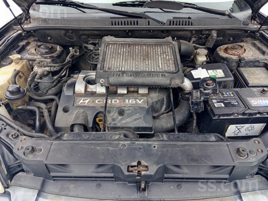 Melns Hyundai Santa Fe 2005 Preiļi, ar dzinēja tilpumu 2.00 L un nobraukumu 300 tūkst. km par 2100 €, foto 12 vietnē AUTOMOTO.COM.LV