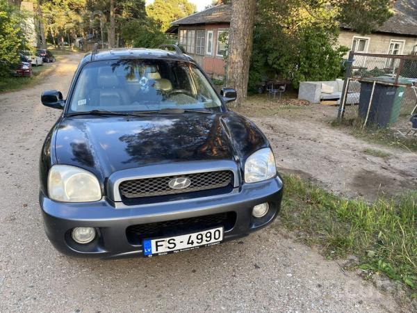 Melns Hyundai Santa Fe 2005 Ventspils, ar dzinēja tilpumu 2.00 L un nobraukumu 287 tūkst. km par 1100 €, foto 1 vietnē AUTOMOTO.COM.LV