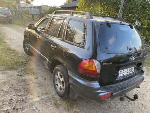 Melns Hyundai Santa Fe 2005 Ventspils, ar dzinēja tilpumu 2.00 L un nobraukumu 287 tūkst. km par 1100 €, foto 6 vietnē AUTOMOTO.COM.LV