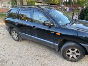 Melns Hyundai Santa Fe 2005 Ventspils, ar dzinēja tilpumu 2.00 L un nobraukumu 287 tūkst. km par 1100 €, foto 7 vietnē AUTOMOTO.COM.LV