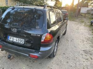 Melns Hyundai Santa Fe 2005 Ventspils, ar dzinēja tilpumu 2.00 L un nobraukumu 287 tūkst. km par 1100 €, foto 8 vietnē AUTOMOTO.COM.LV