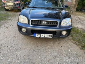 Melns Hyundai Santa Fe 2005 Ventspils, ar dzinēja tilpumu 2.00 L un nobraukumu 287 tūkst. km par 1100 €, foto 9 vietnē AUTOMOTO.COM.LV